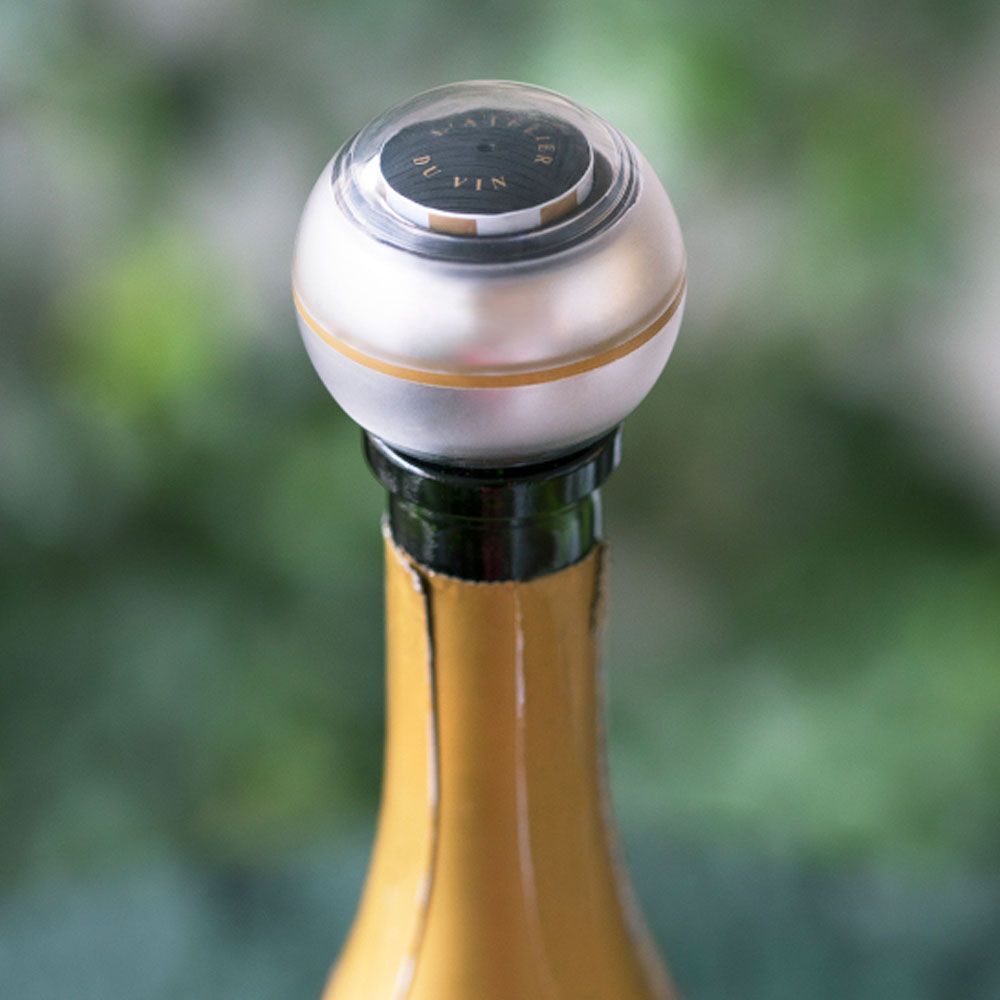 Champagne bubble indicator and stopper